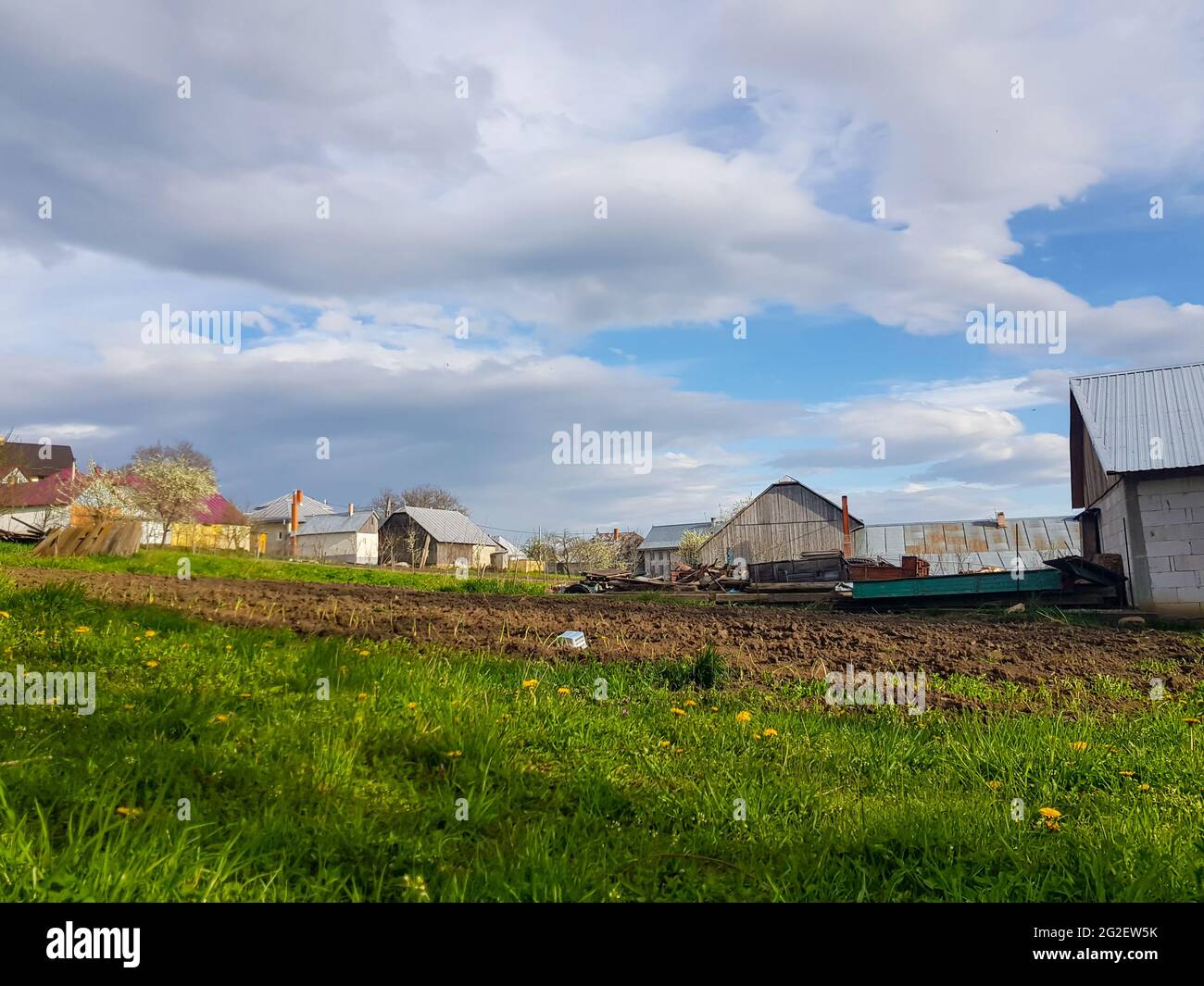 Scenic rural landscape with old houses on a cloudy day Stock Photo - Alamy