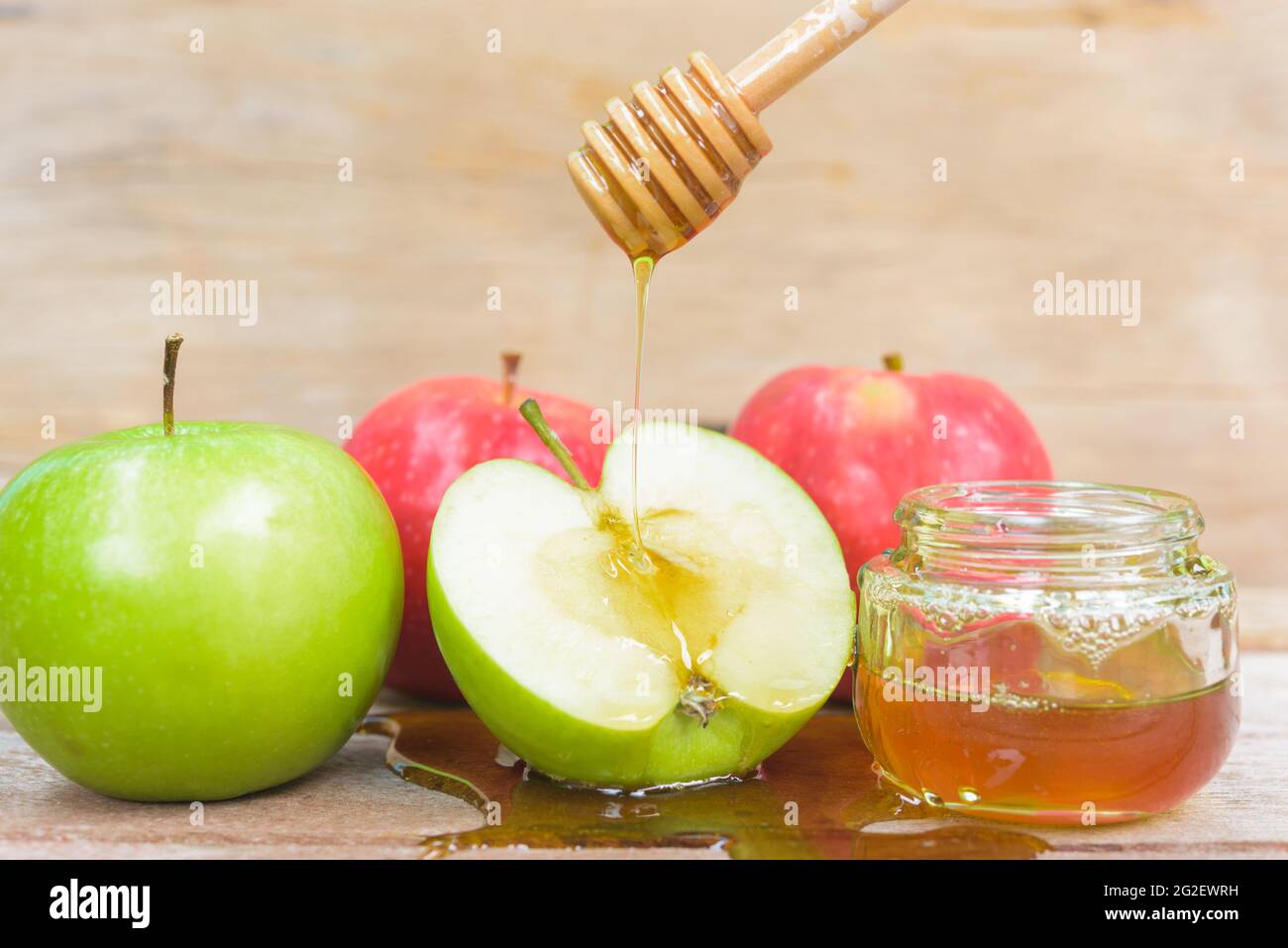 Jewish holiday, Apple Rosh Hashanah, the photo have honey in jar and ...