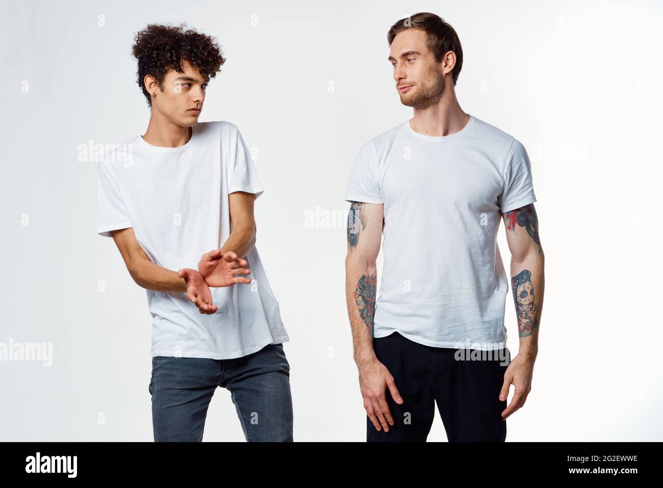 two men friendship hug emotions communication studio Stock Photo - Alamy