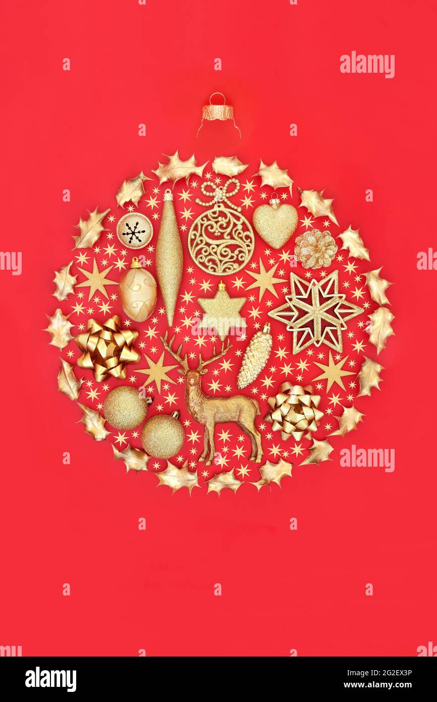 Christmas bauble shape with gold stars and decorations on red ...