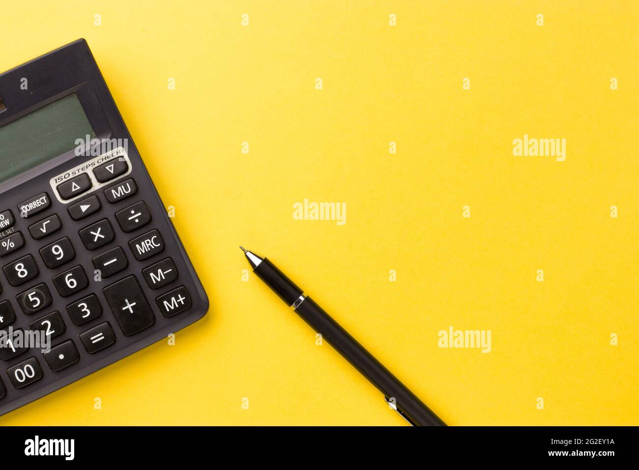 Black calculator on texture background stock image Stock Photo - Alamy