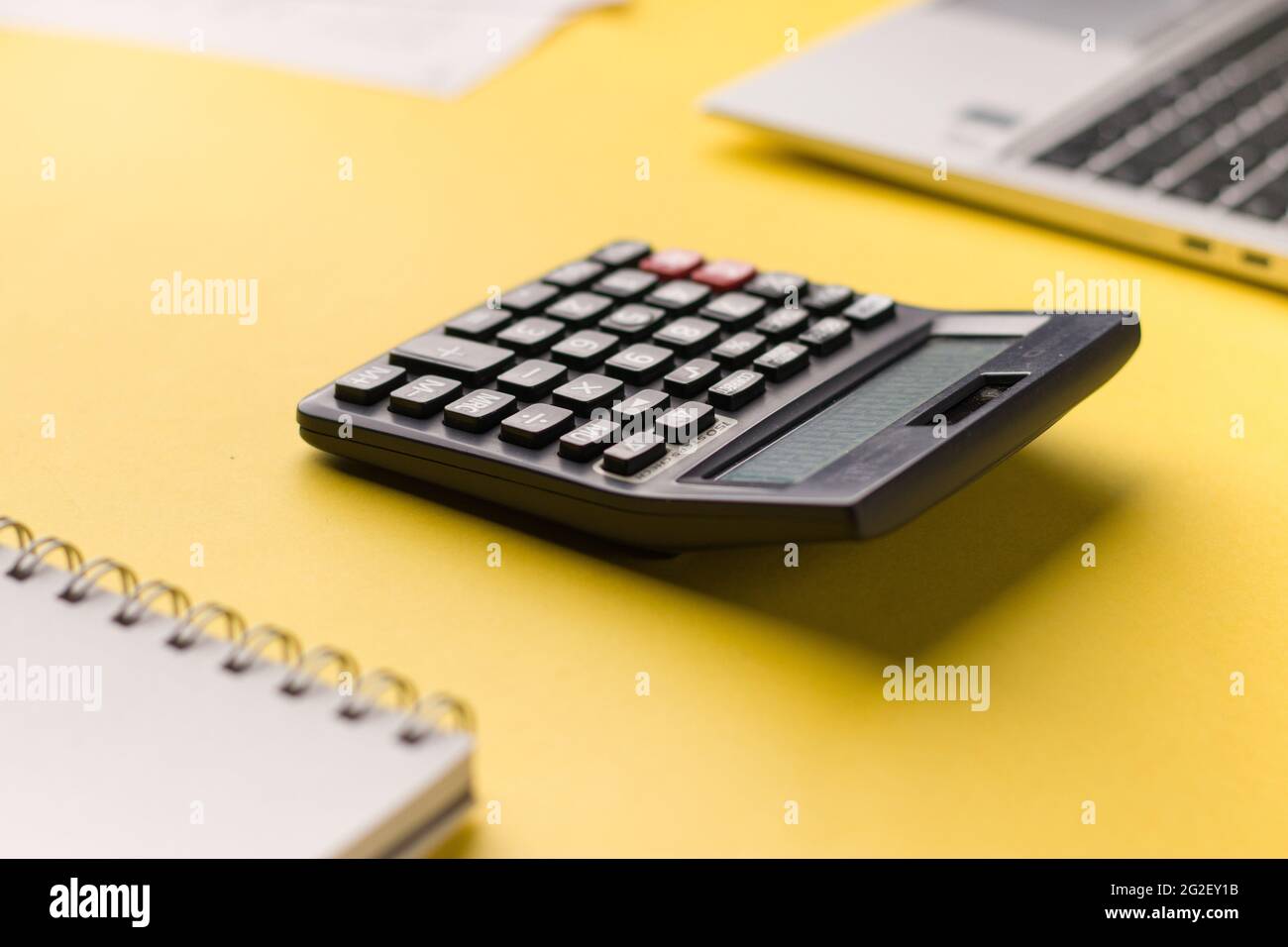 Black calculator on texture background stock image Stock Photo - Alamy