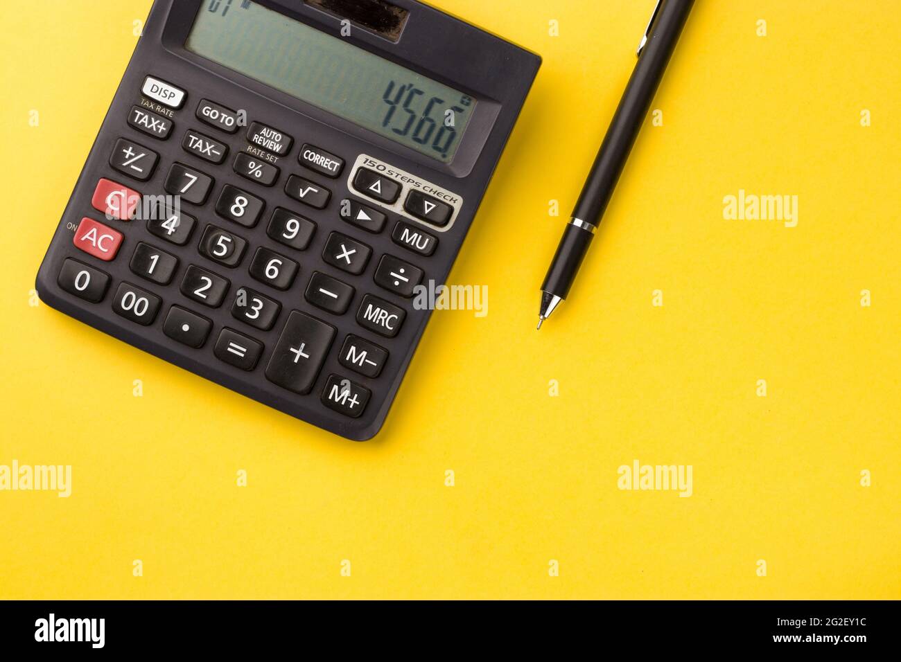 Black calculator on texture background stock image Stock Photo - Alamy