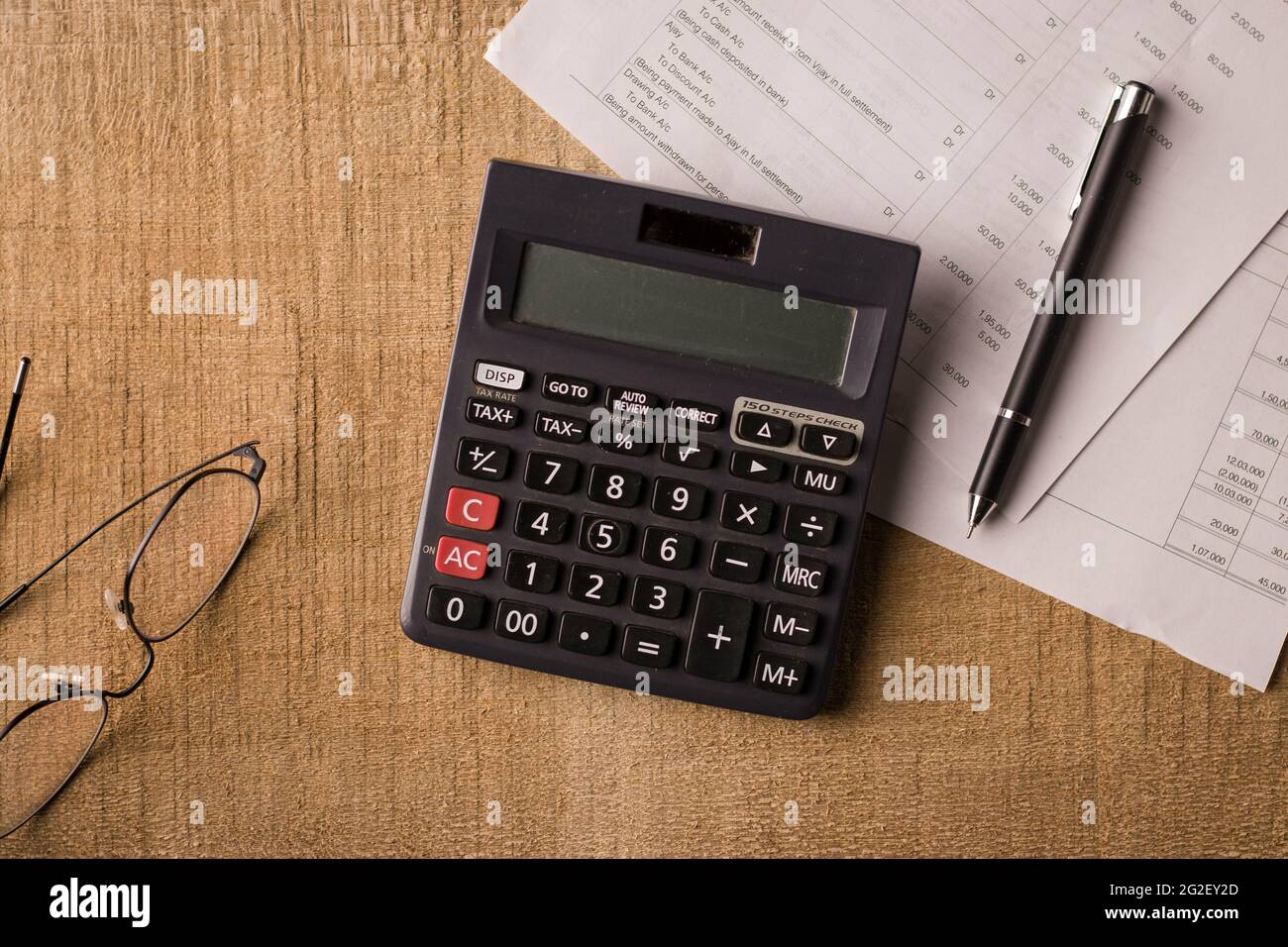 Black calculator on texture background stock image Stock Photo - Alamy