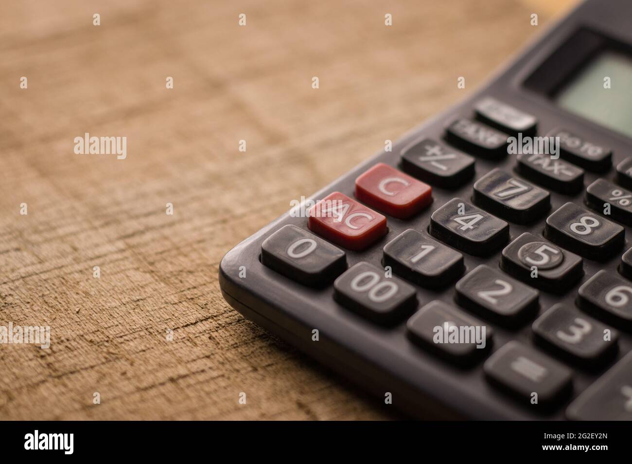 Black calculator on texture background stock image Stock Photo - Alamy