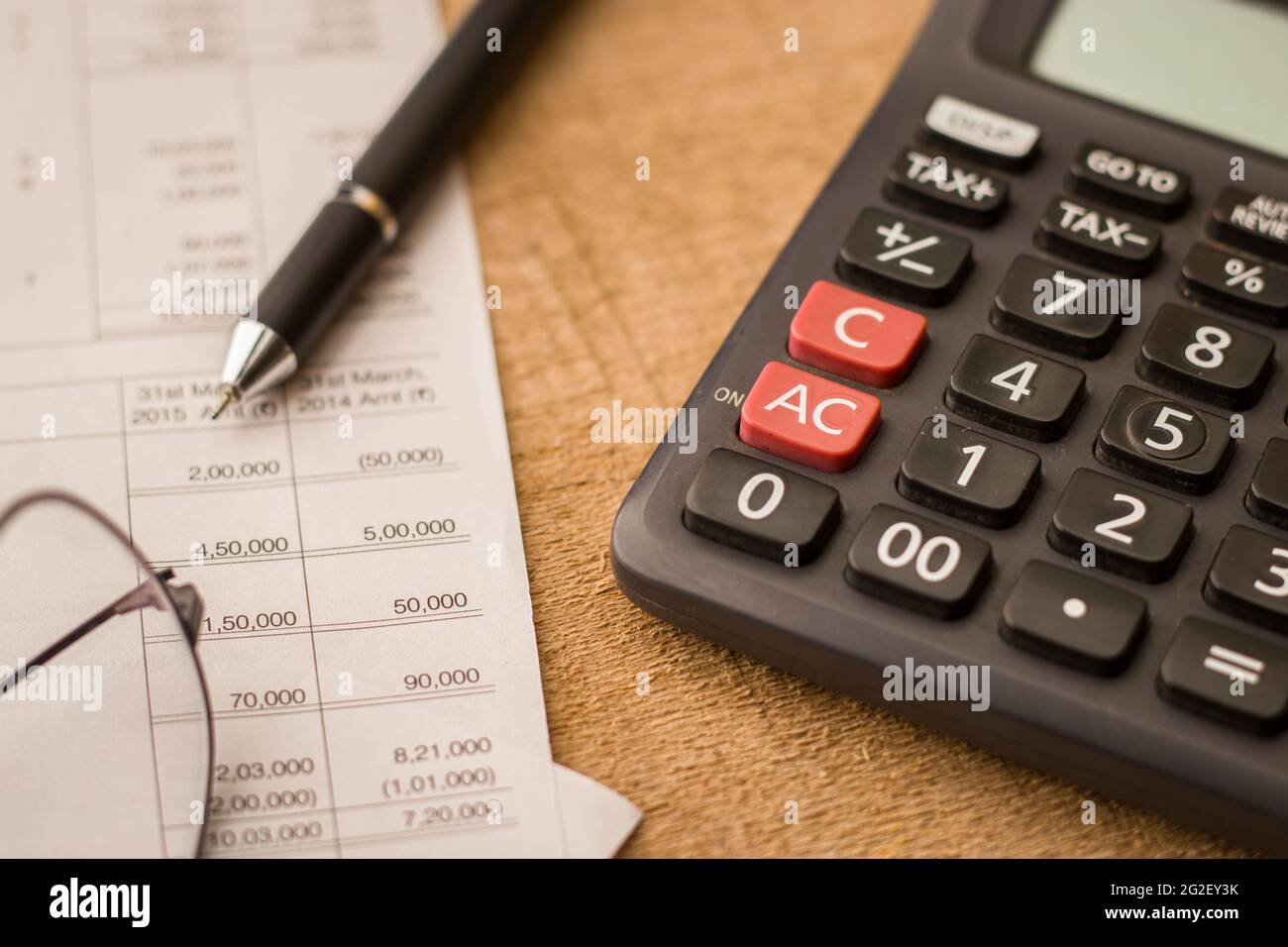 Black calculator on texture background stock image Stock Photo - Alamy