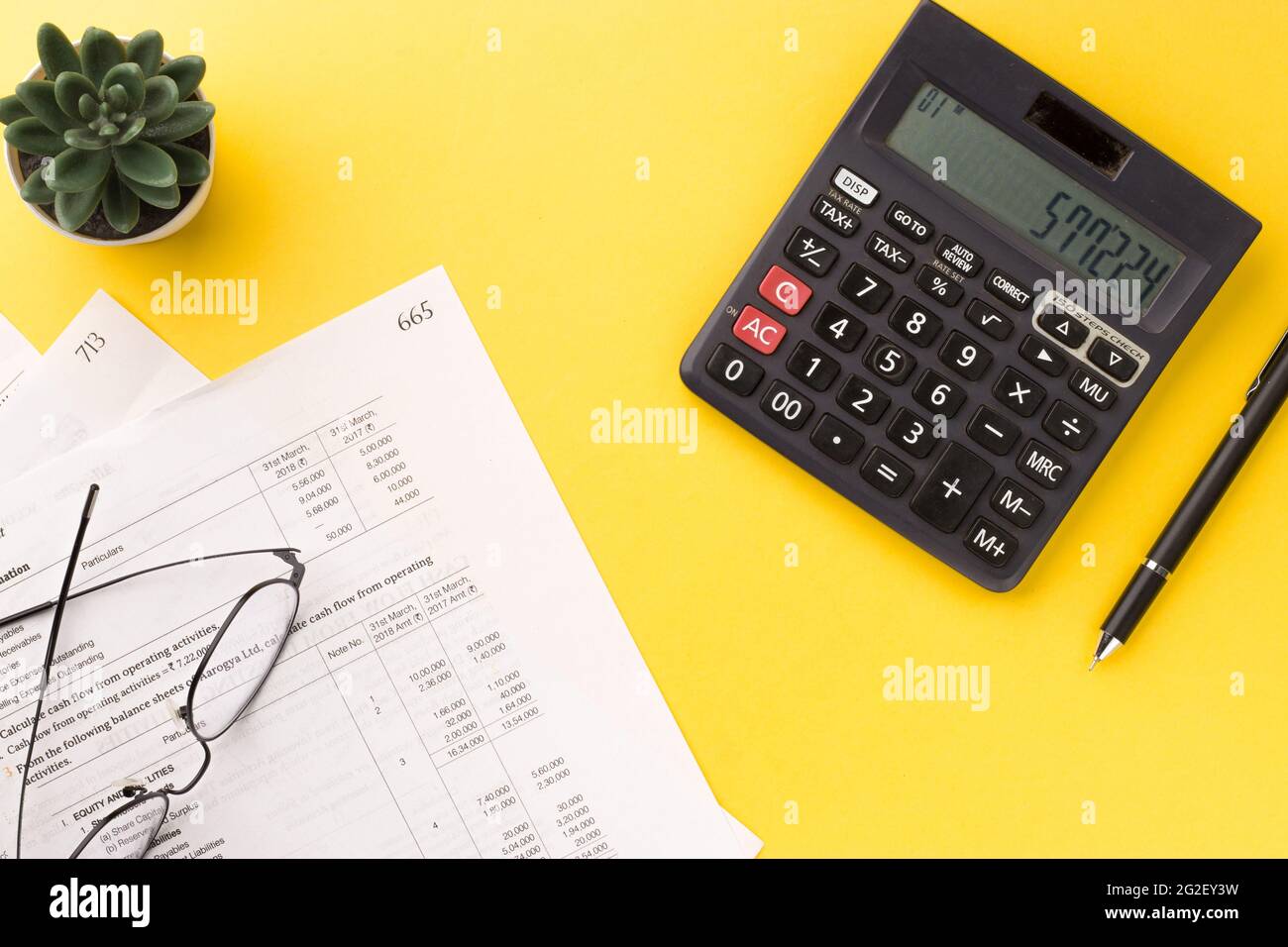 Black calculator on texture background stock image Stock Photo - Alamy