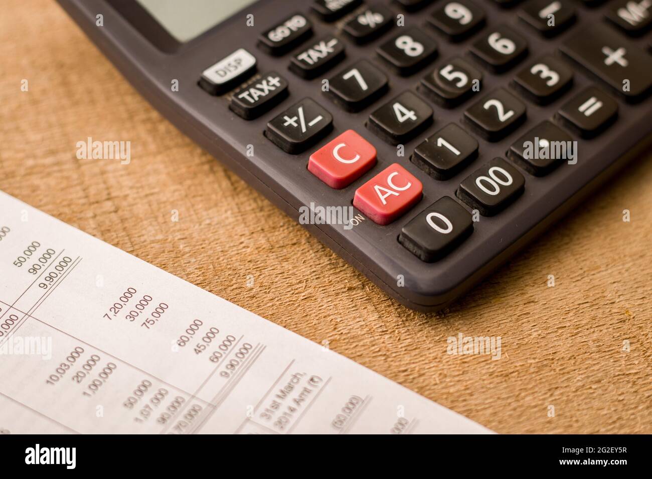 Black calculator on texture background stock image Stock Photo - Alamy