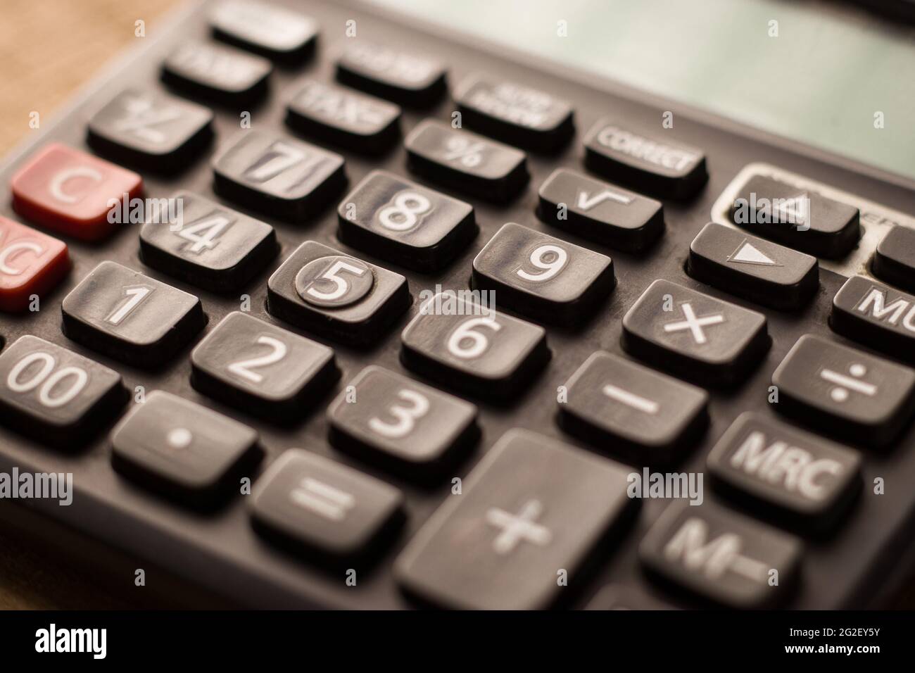 Black calculator on texture background stock image Stock Photo - Alamy
