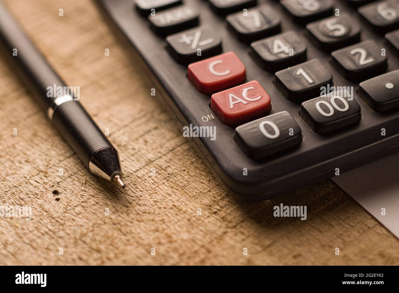 Black calculator on texture background stock image Stock Photo - Alamy