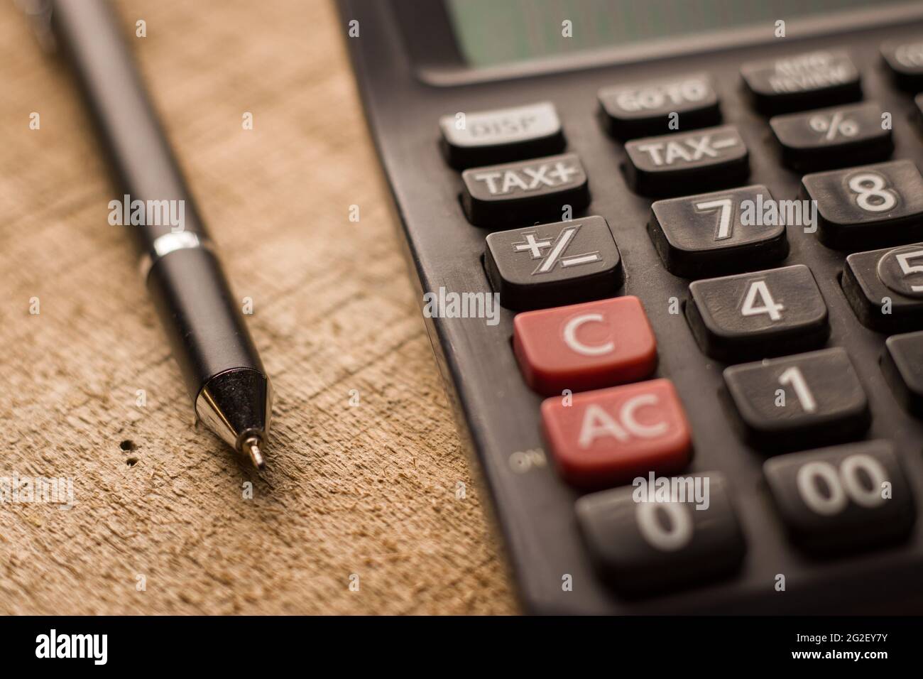 Black calculator on texture background stock image Stock Photo - Alamy
