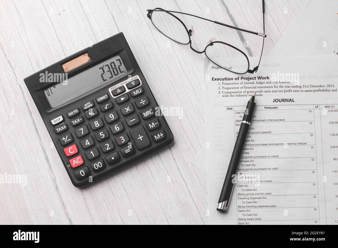 Black calculator on texture background stock image Stock Photo - Alamy