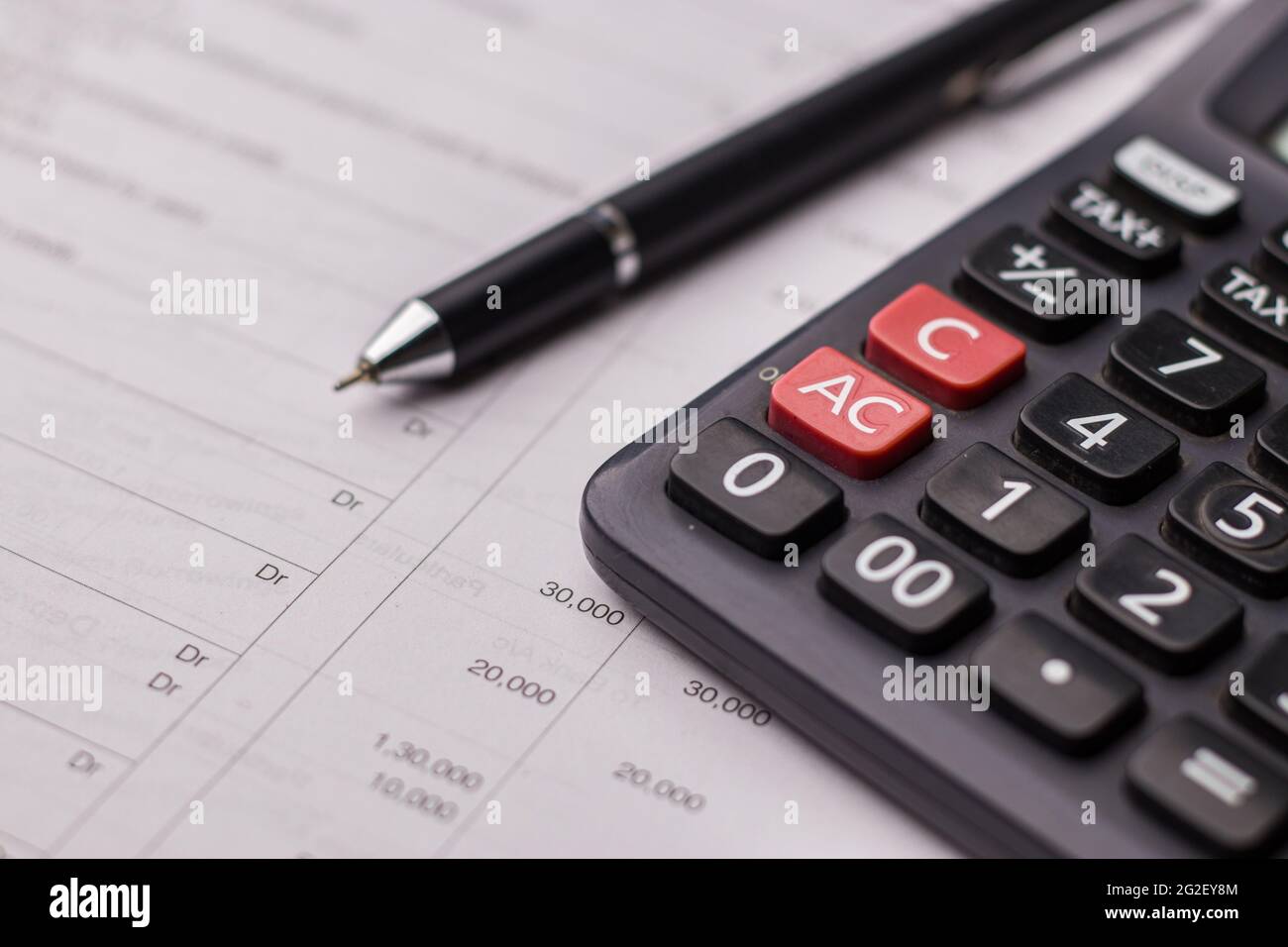 Black calculator on texture background stock image Stock Photo - Alamy