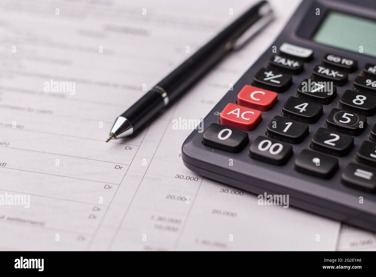 Black calculator on texture background stock image Stock Photo - Alamy