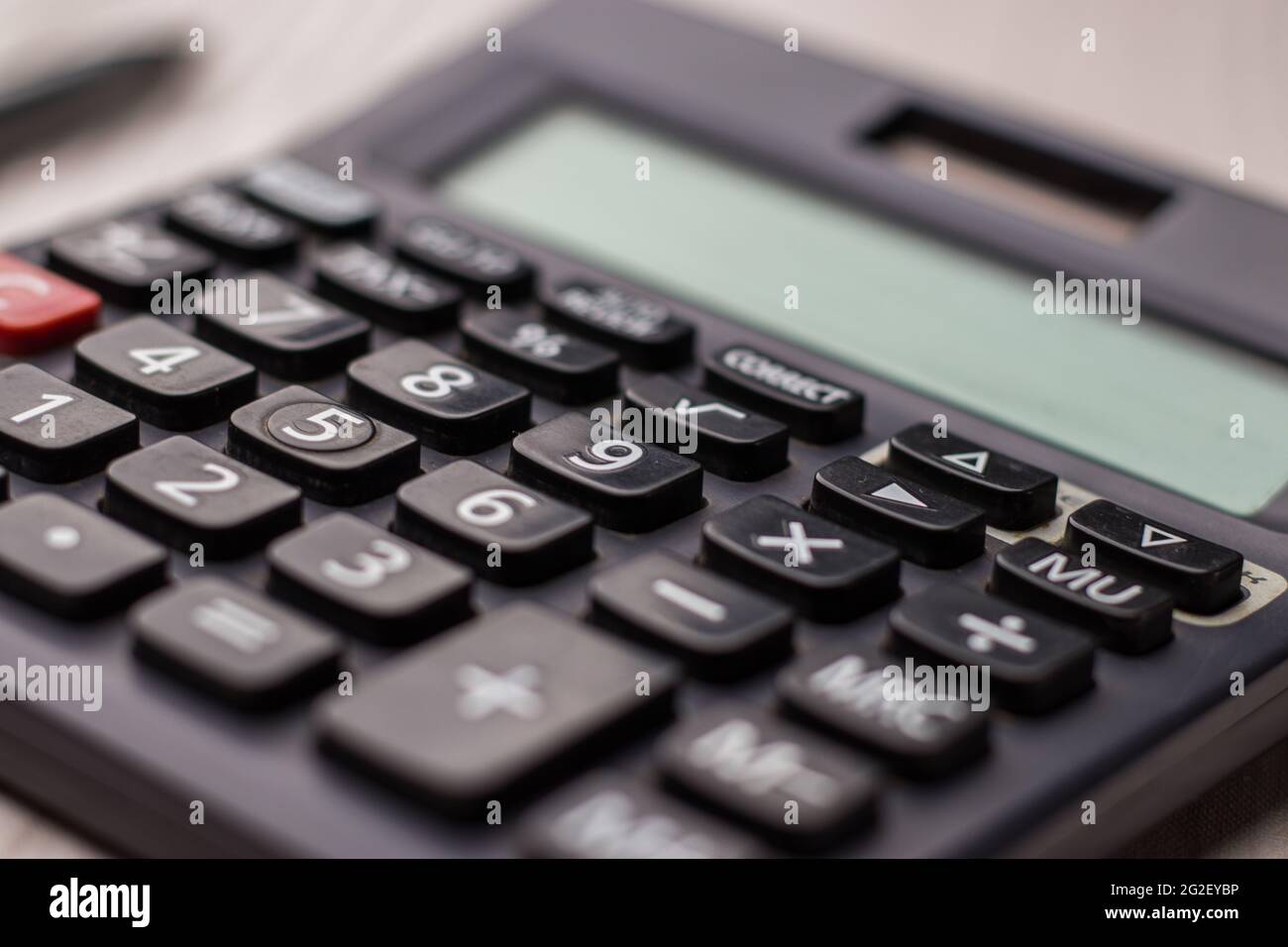 Black calculator on texture background stock image Stock Photo - Alamy