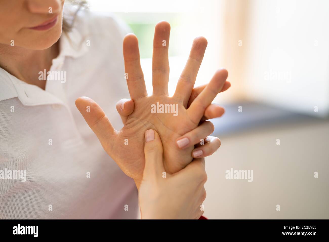Reflexology Hand Massage And Physiotherapy. Elder Man Having ...