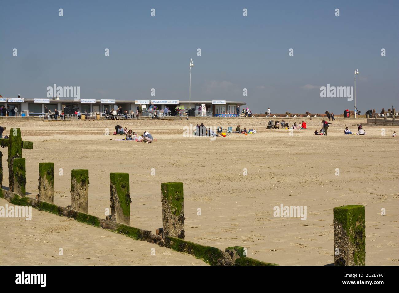 People enjoying the sandy beach at Littlehampton, West Sussex, England ...