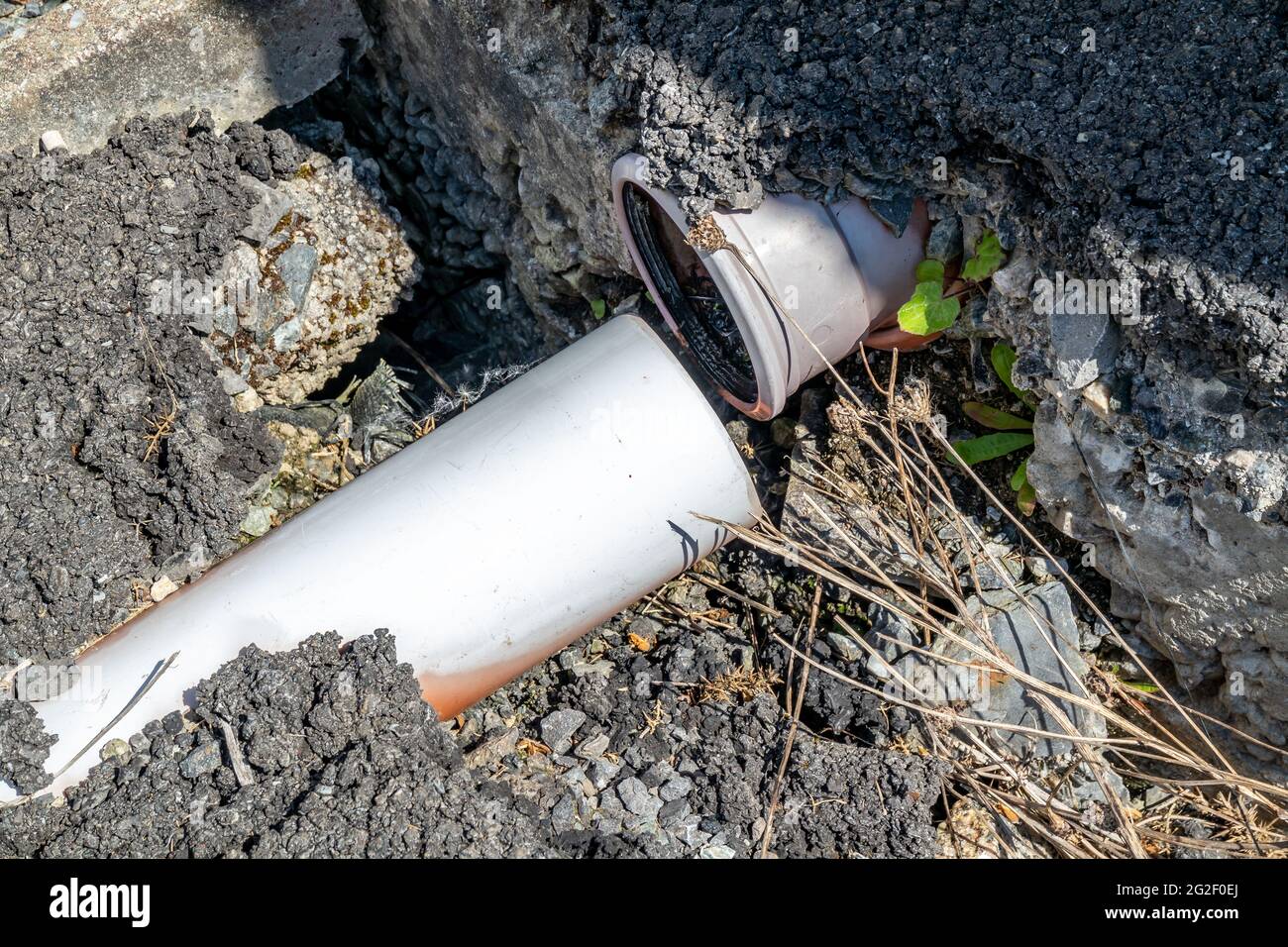 Broken pipes due to subsidence of building on a peatbog Stock Photo - Alamy