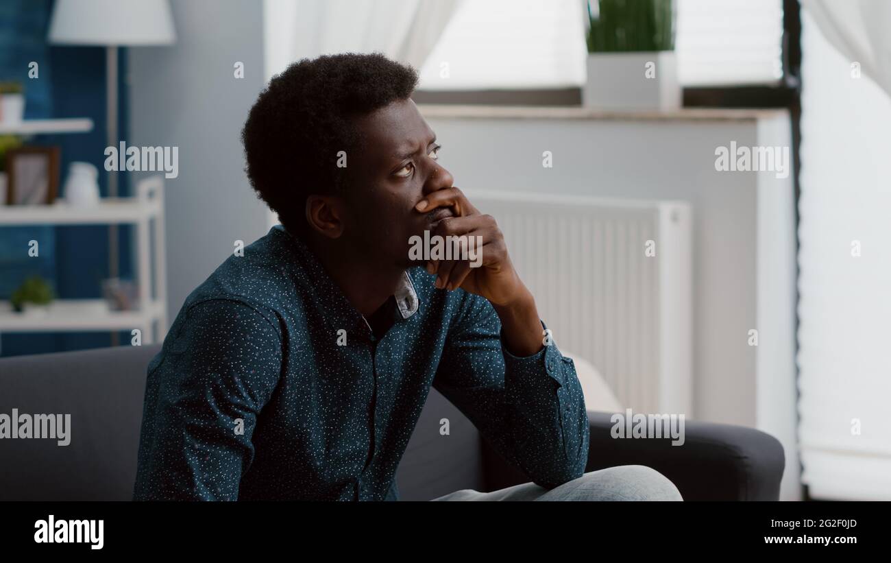 Portrait of pensive thoughtful authentic african american man looking ...