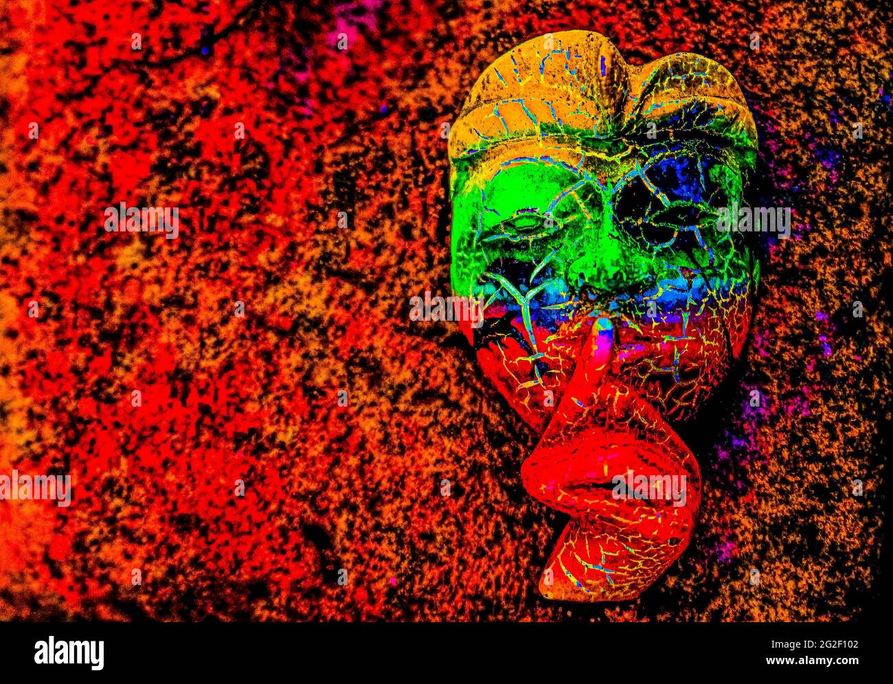 A Bali face mask with finger on its mouth Stock Photo - Alamy