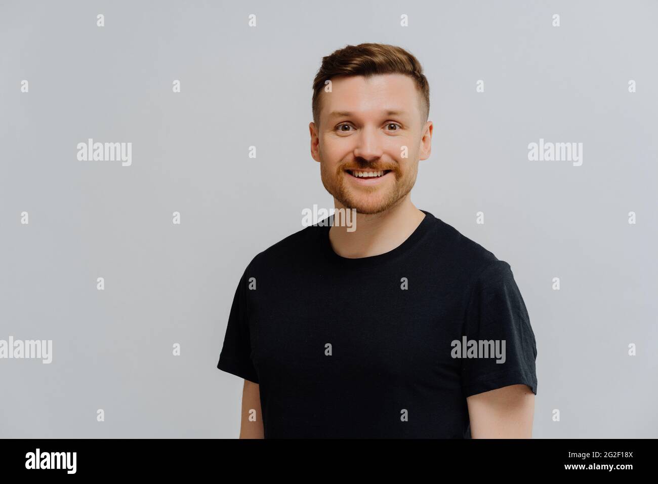 Good looking ginger man smiling at camera, expressing positivity Stock ...