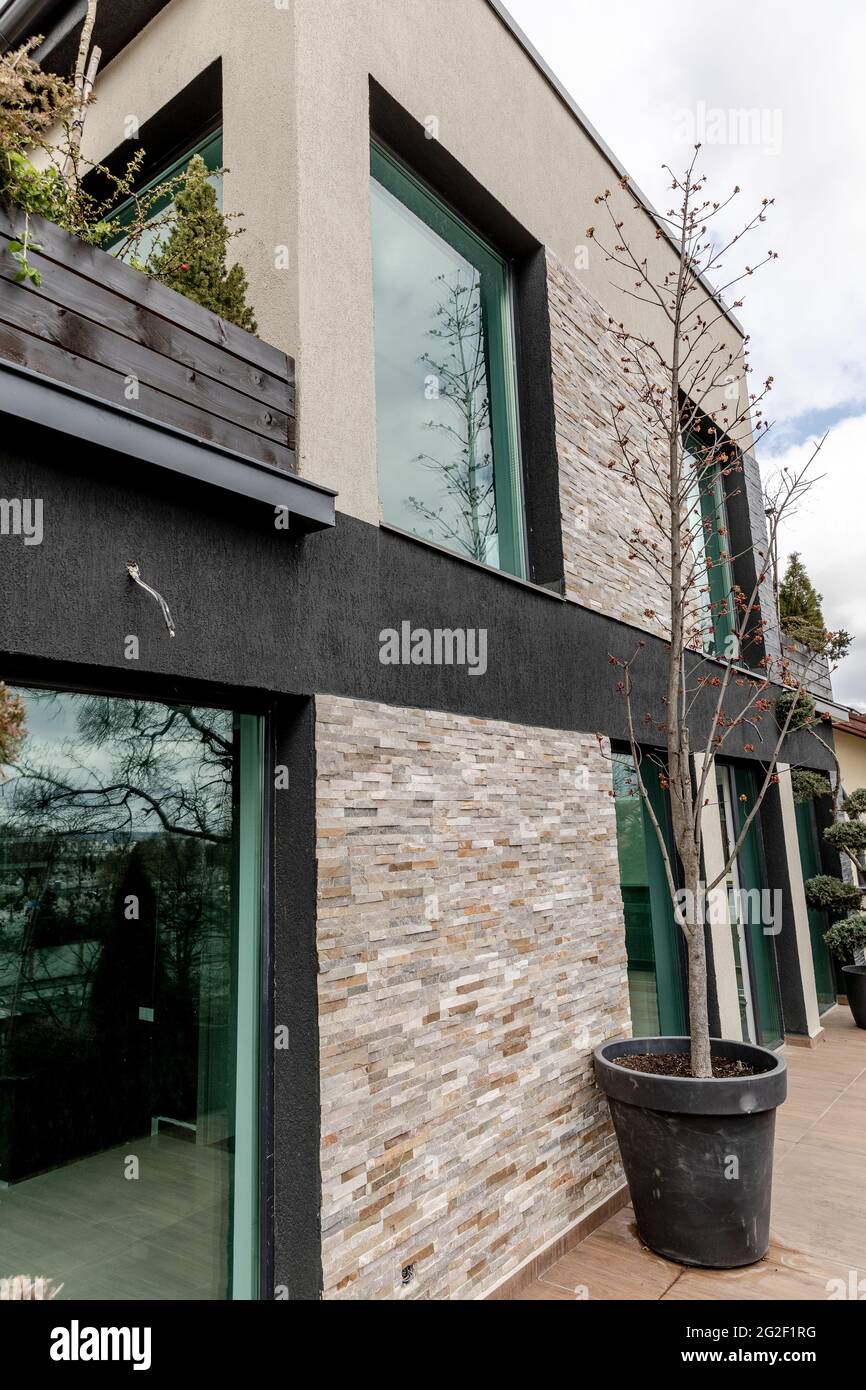 Closeup shot of a house facade under a cloudy sky Stock Photo - Alamy