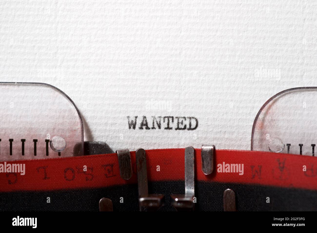 The word wanted written with a typewriter Stock Photo - Alamy