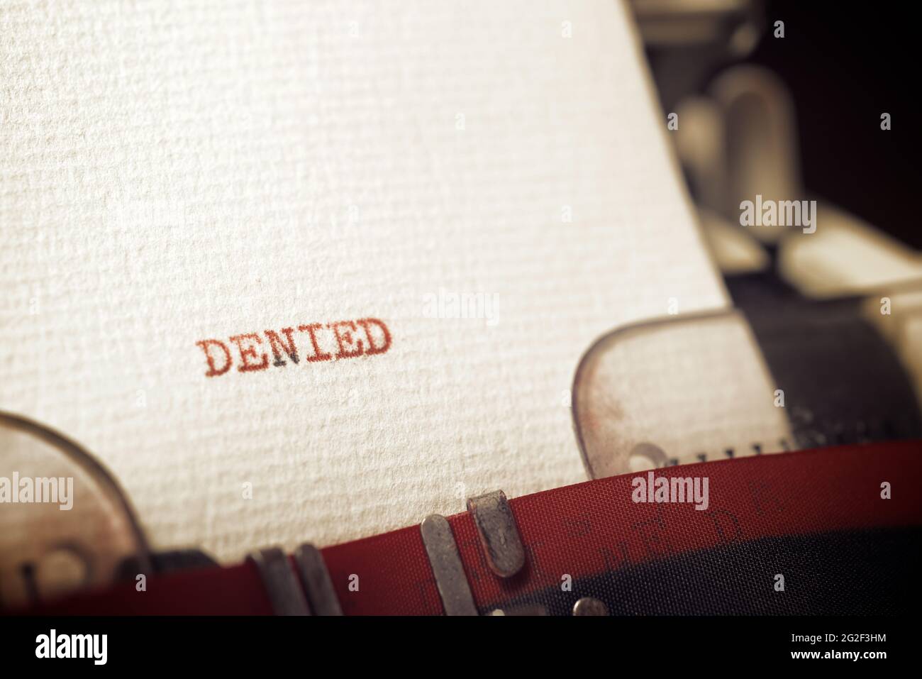 The word denied written with a typewriter Stock Photo - Alamy