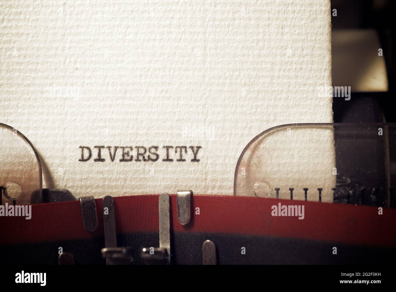 The word diversity written with a typewriter Stock Photo - Alamy