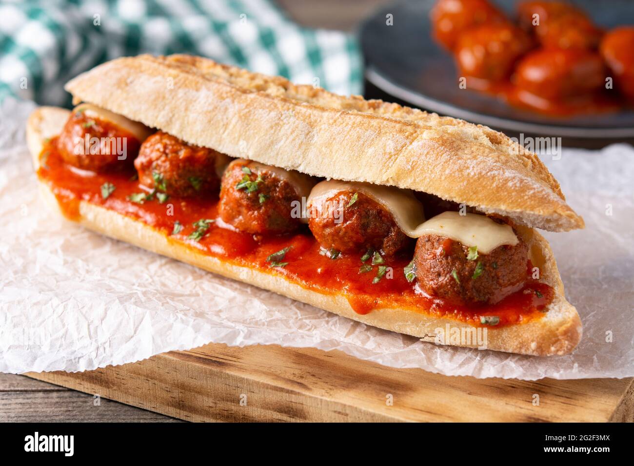 Meatball sub sandwich on wooden table Stock Photo - Alamy