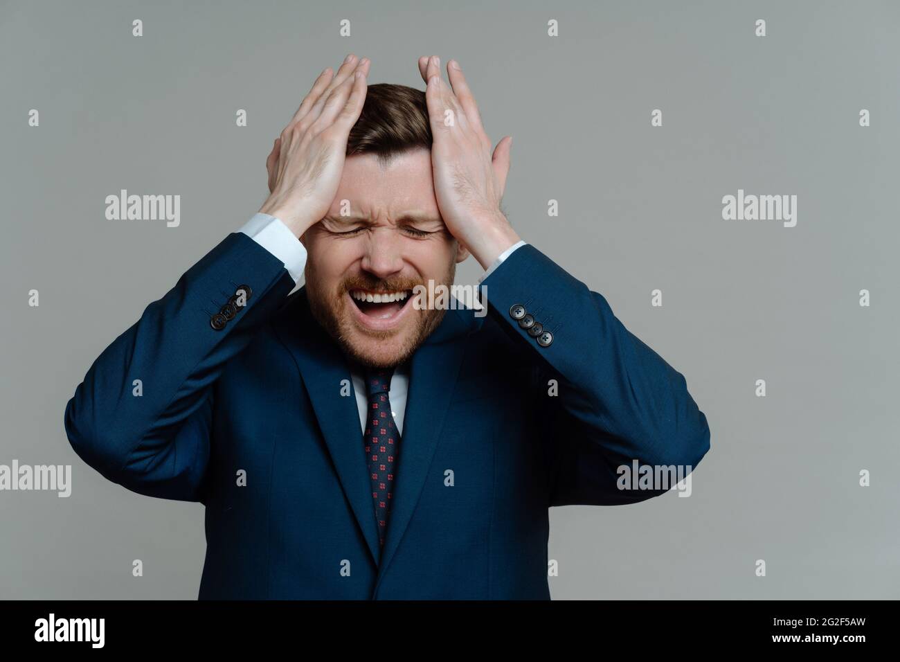 Upset businessman feeling stressed of failure at work Stock Photo - Alamy