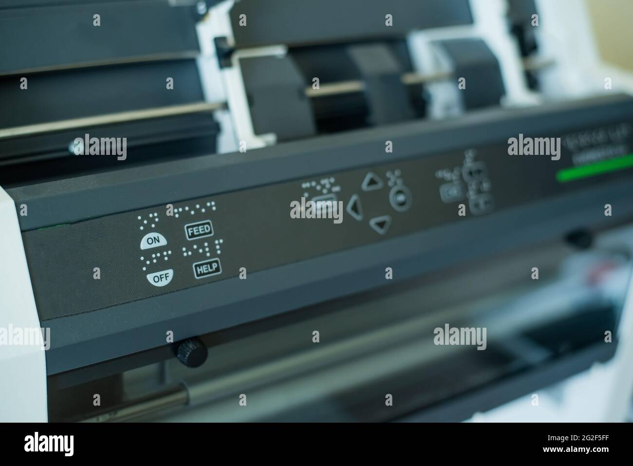 Close-up of equipment to print text on braille code for reading the ...