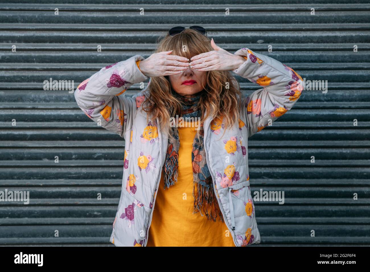 Girl cover face hands hi-res stock photography and images - Alamy