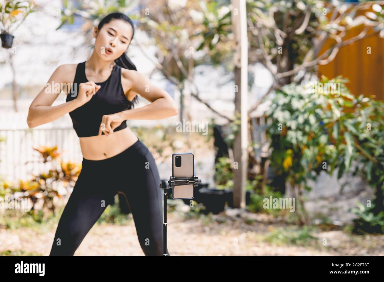 Women online influencer blogger content creator dancing show with ...