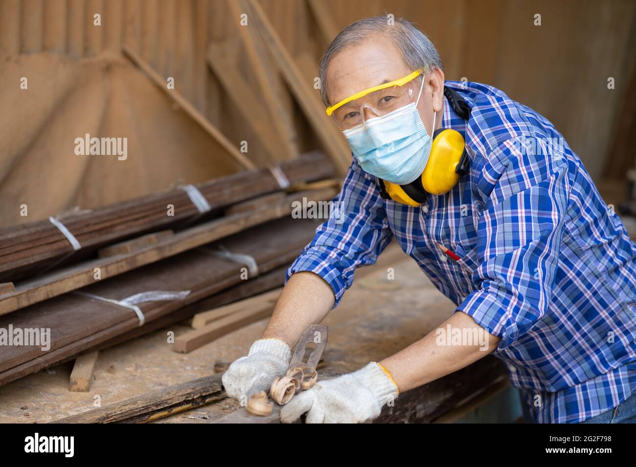 Portrait of elder wood worker hobby for good retirement, Asian male ...
