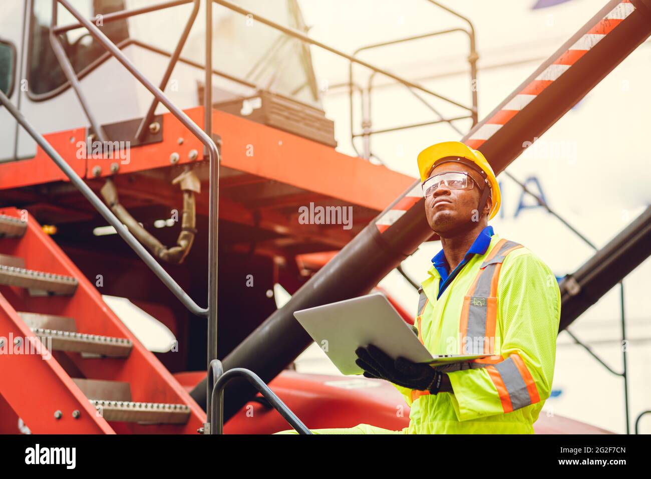 Black African port shipping staff director working in logistic using ...