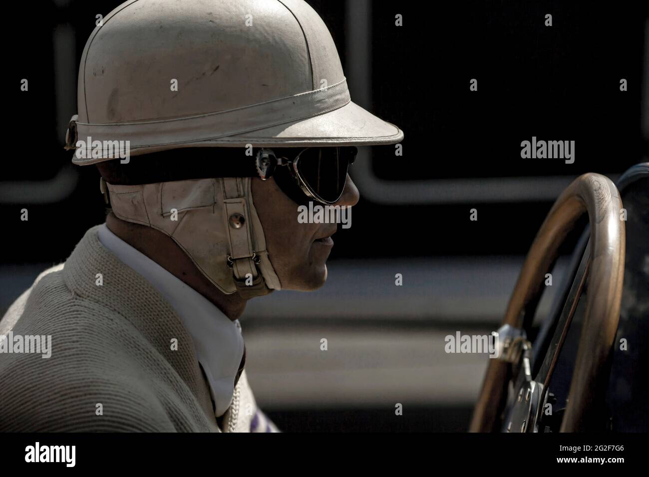 Race driver with goggles and helmet at the the Montlhery Revival in ...