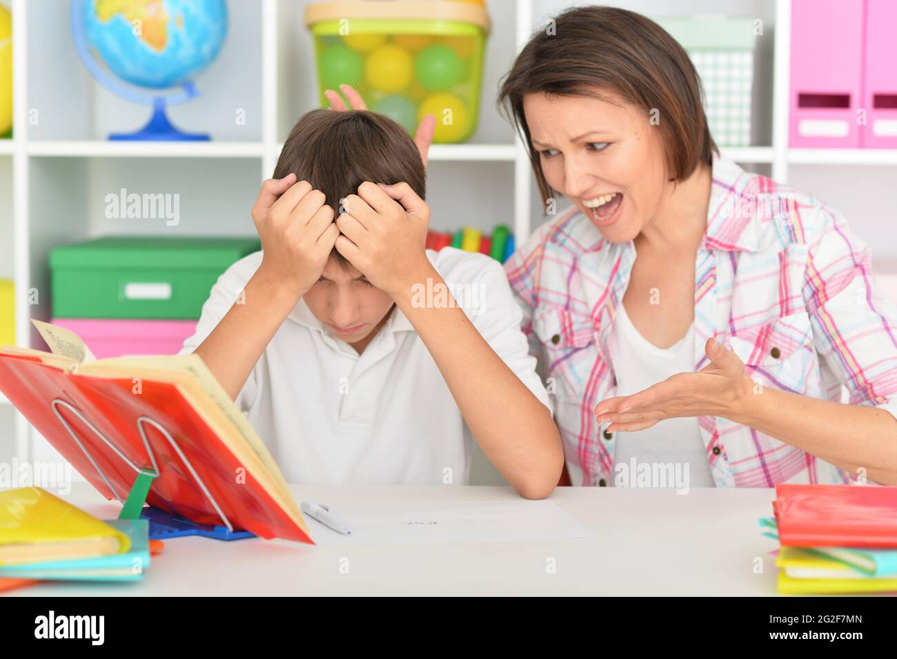 Angry mother homework hi-res stock photography and images - Alamy