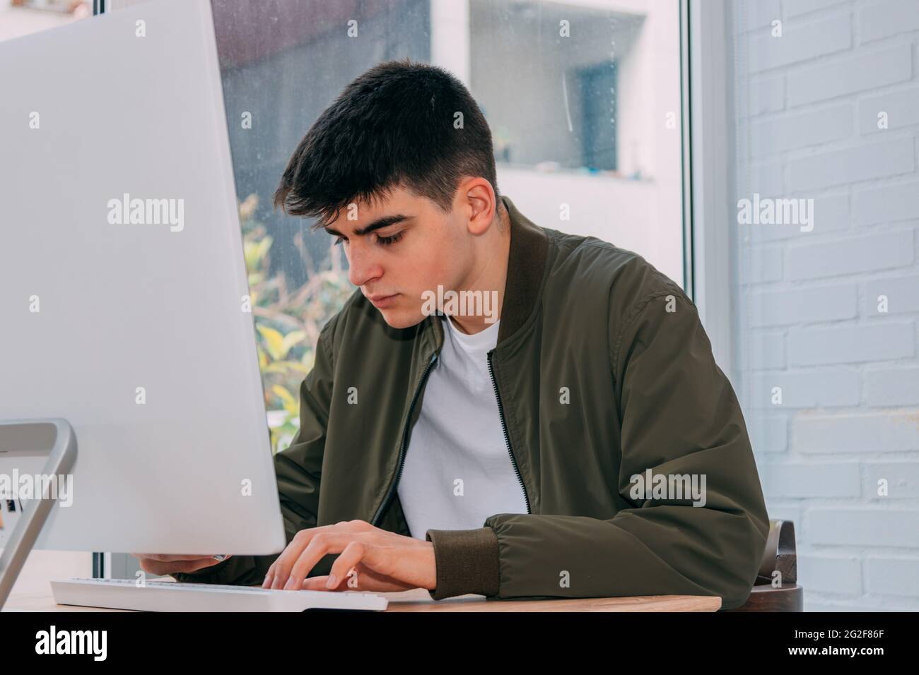 student with computer working or studying Stock Photo - Alamy