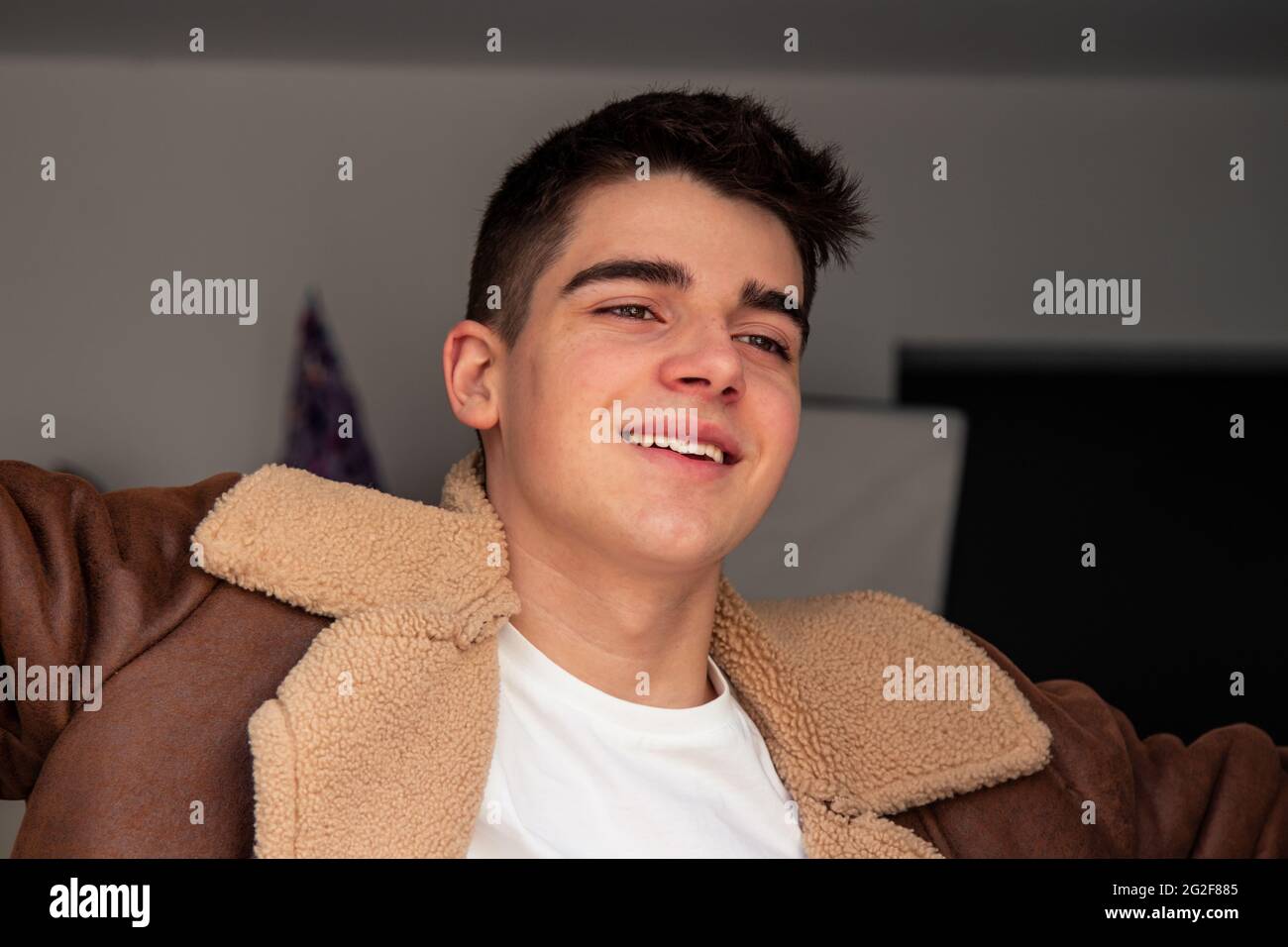 Male teenager smiling hi-res stock photography and images - Alamy