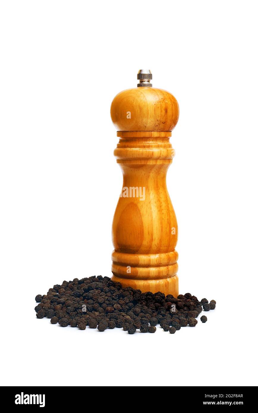 wooden pepper mill with peppercorns isolated on white background Stock ...