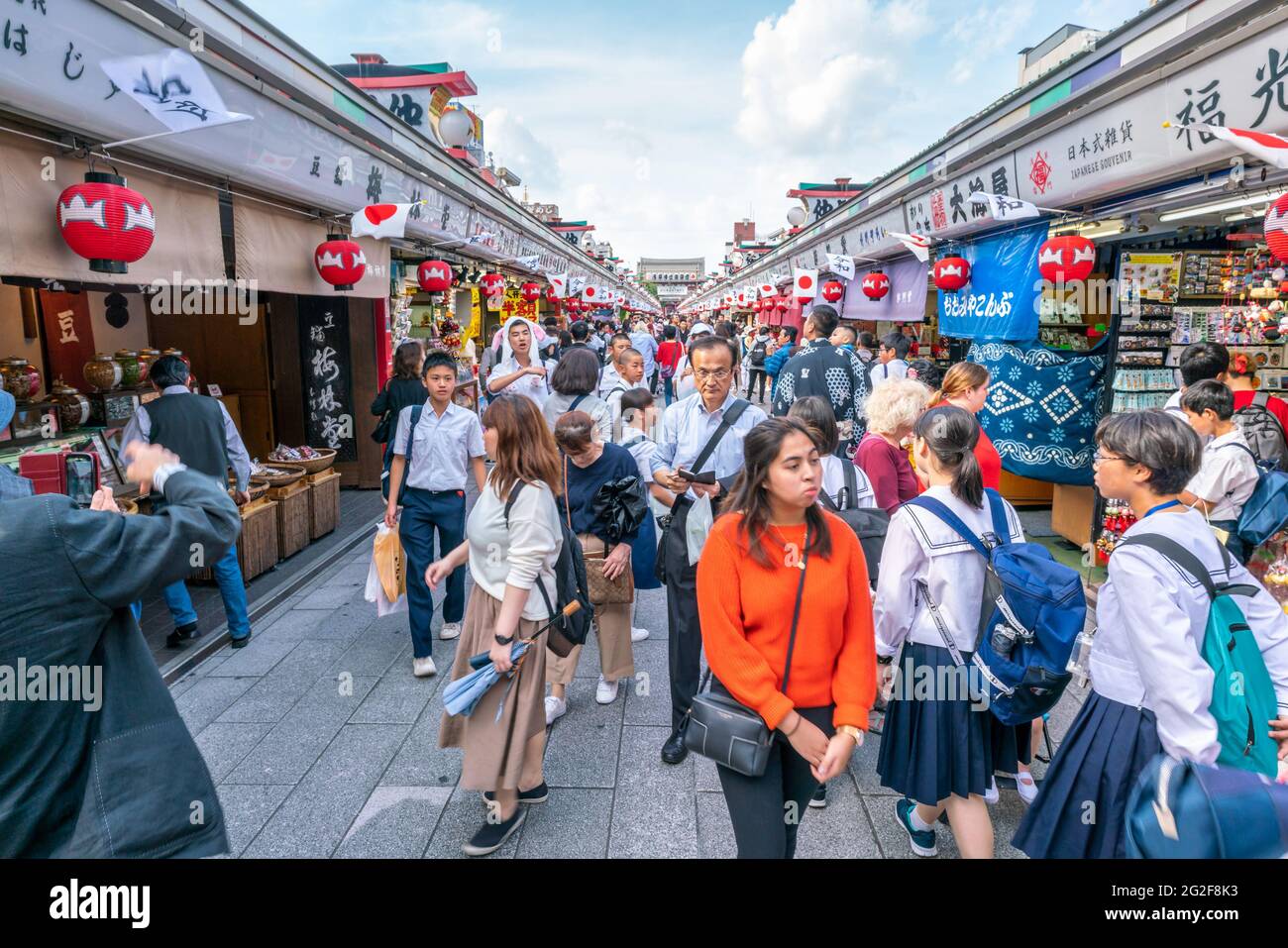 Tokyo, Japan - 05.13.2019: Very crowded row in a market place leading ...