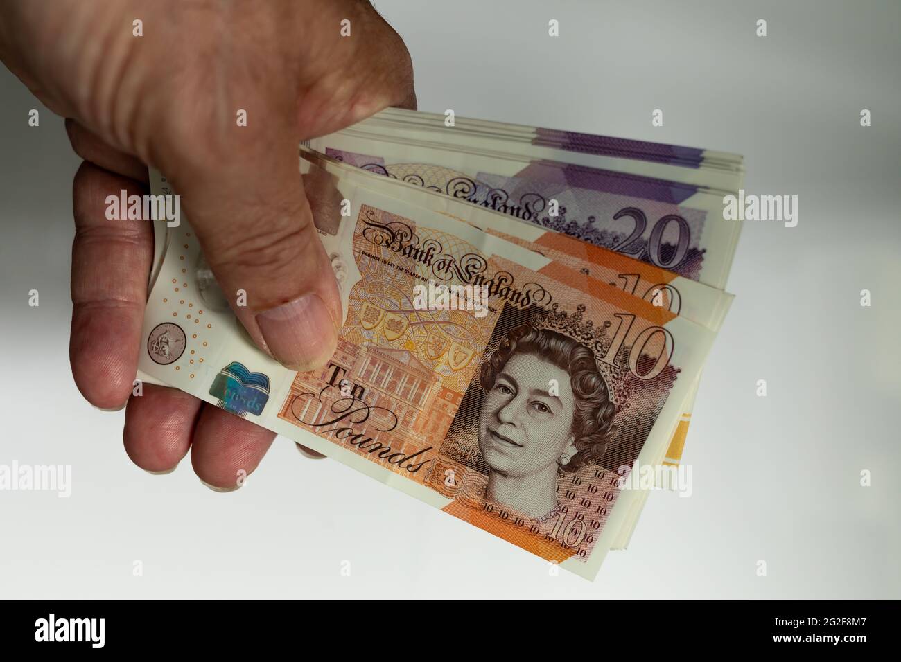 fist full of money Stock Photo - Alamy