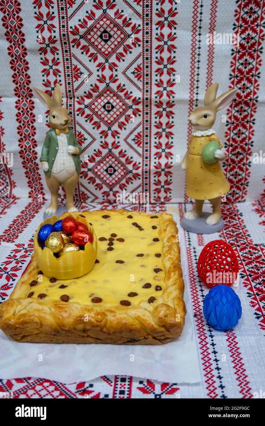 Easter rabbit figurines, colorful egg-shaped sweets, and traditional ...