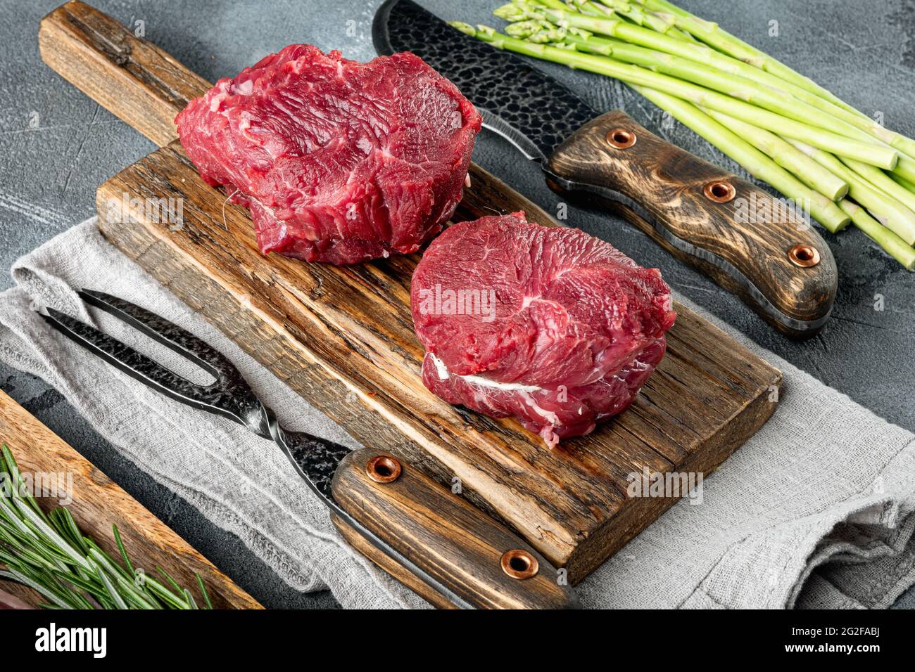 Fillet Mignon tenderloin raw meat veal and beef steaks, on wooden ...