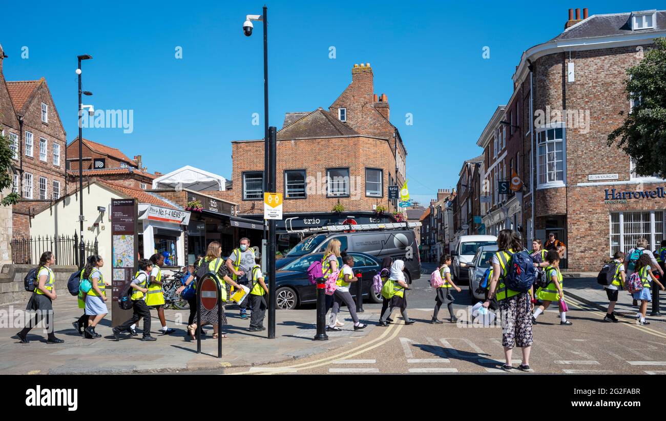 Crossing Whip-Ma-Whop-Ma-Gate, the shortest street in York, North ...