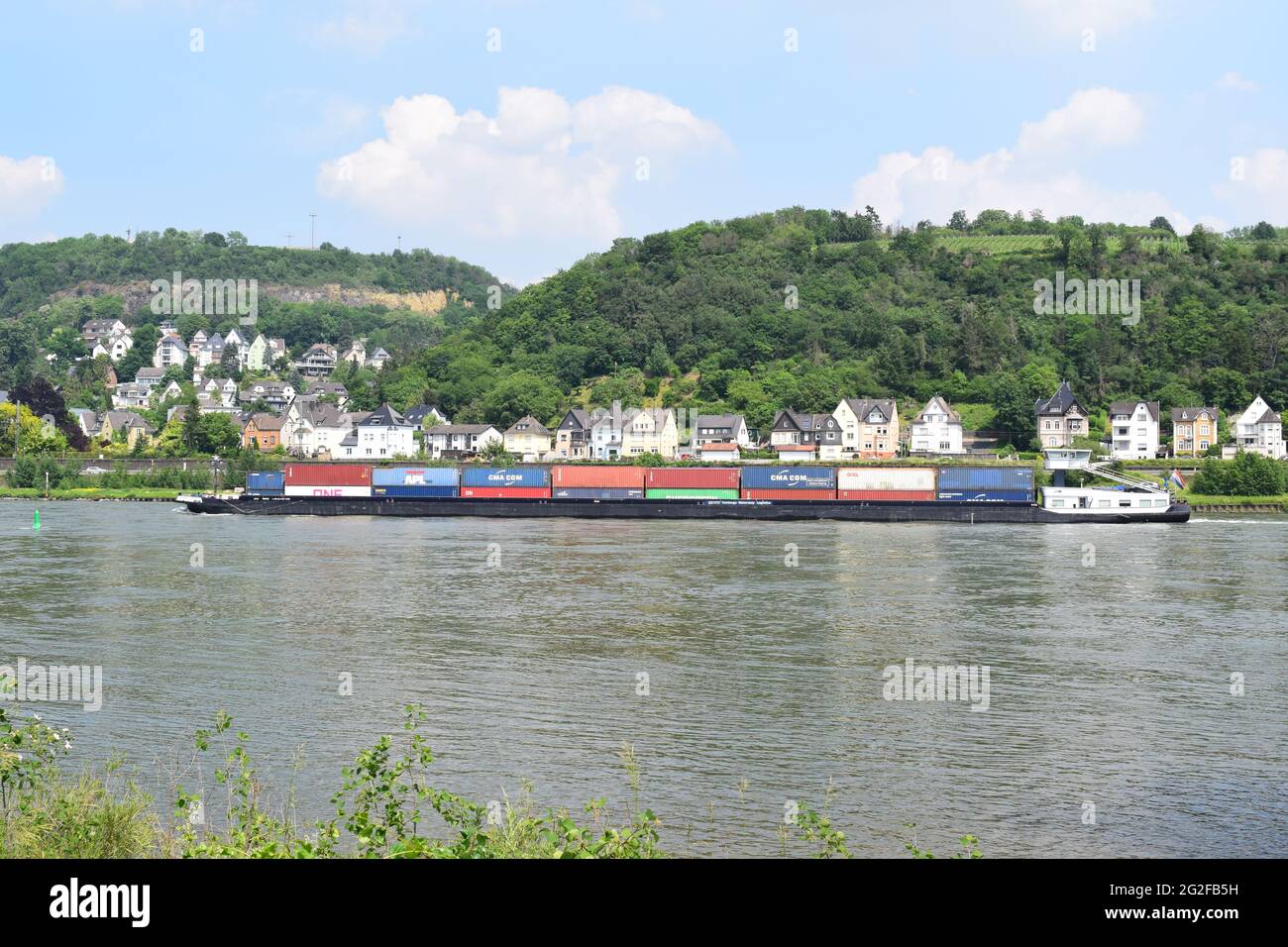 waterfront of Linz with a cargo ship Stock Photo - Alamy