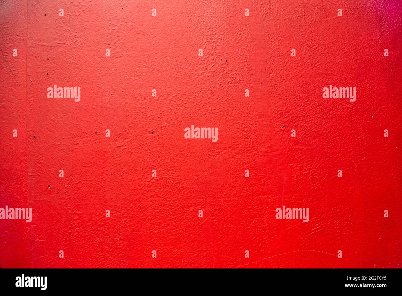 Red wall. Old house facade wall painted in red. Old English house ...