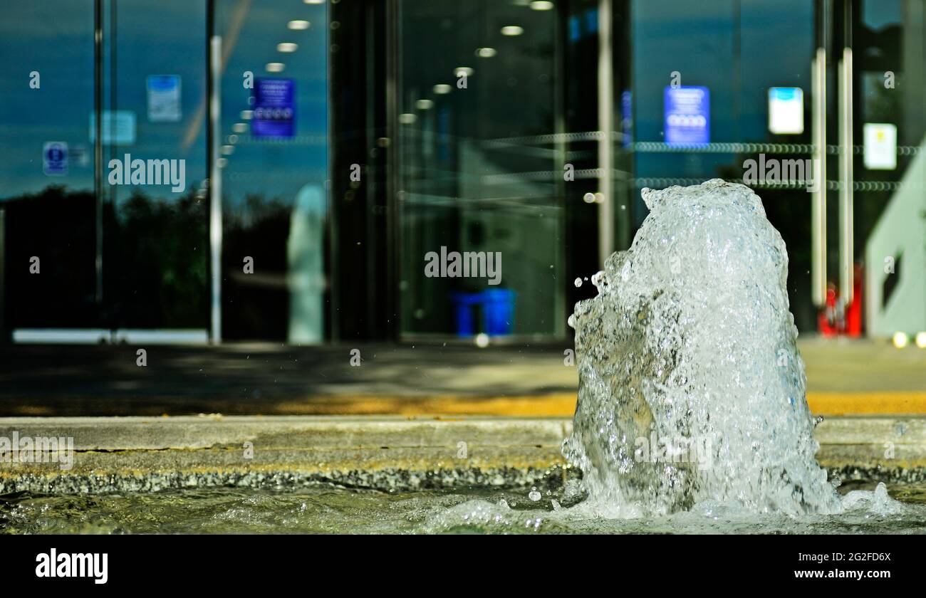 Water fountain close up with building entrance at the background Stock ...