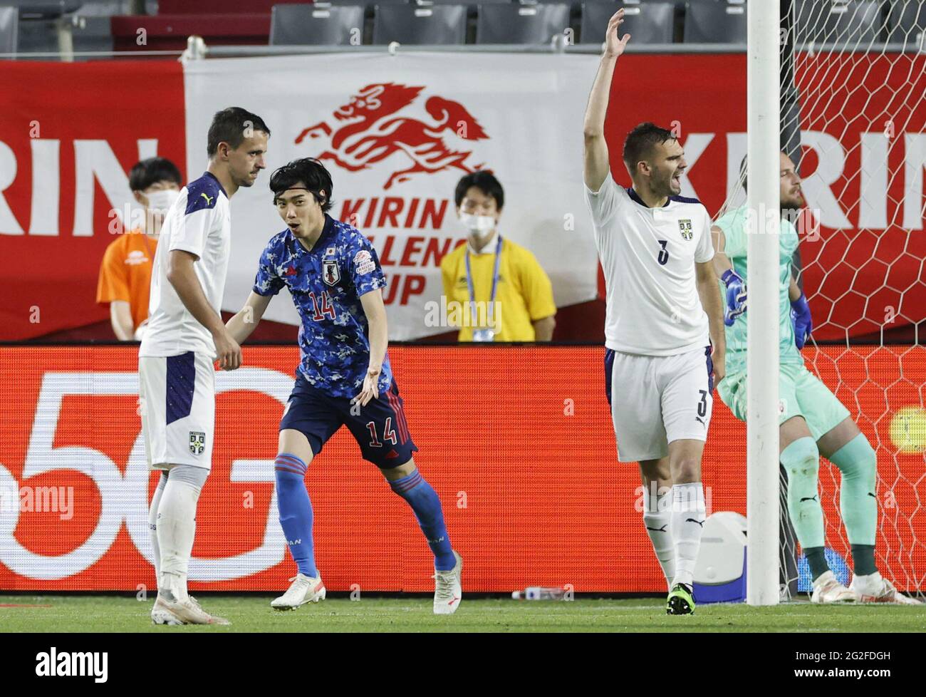 Japan's Junya Ito (14) reacts after scoring early in the second half of ...